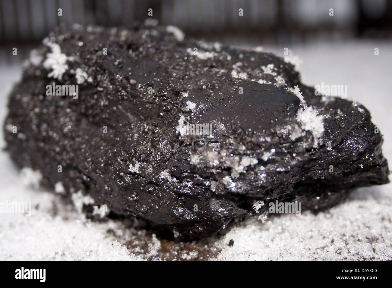 black coal, coal lying in the snow, the black gold of Donetsk Stock ...