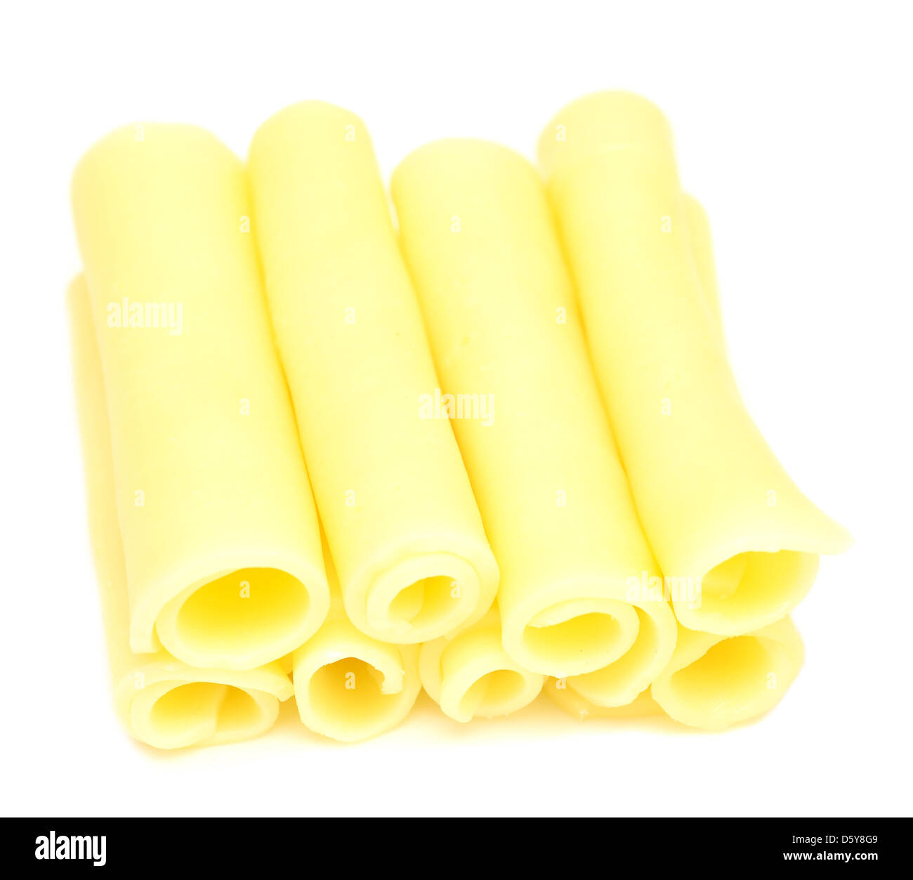rolled cheese on white background Stock Photo - Alamy