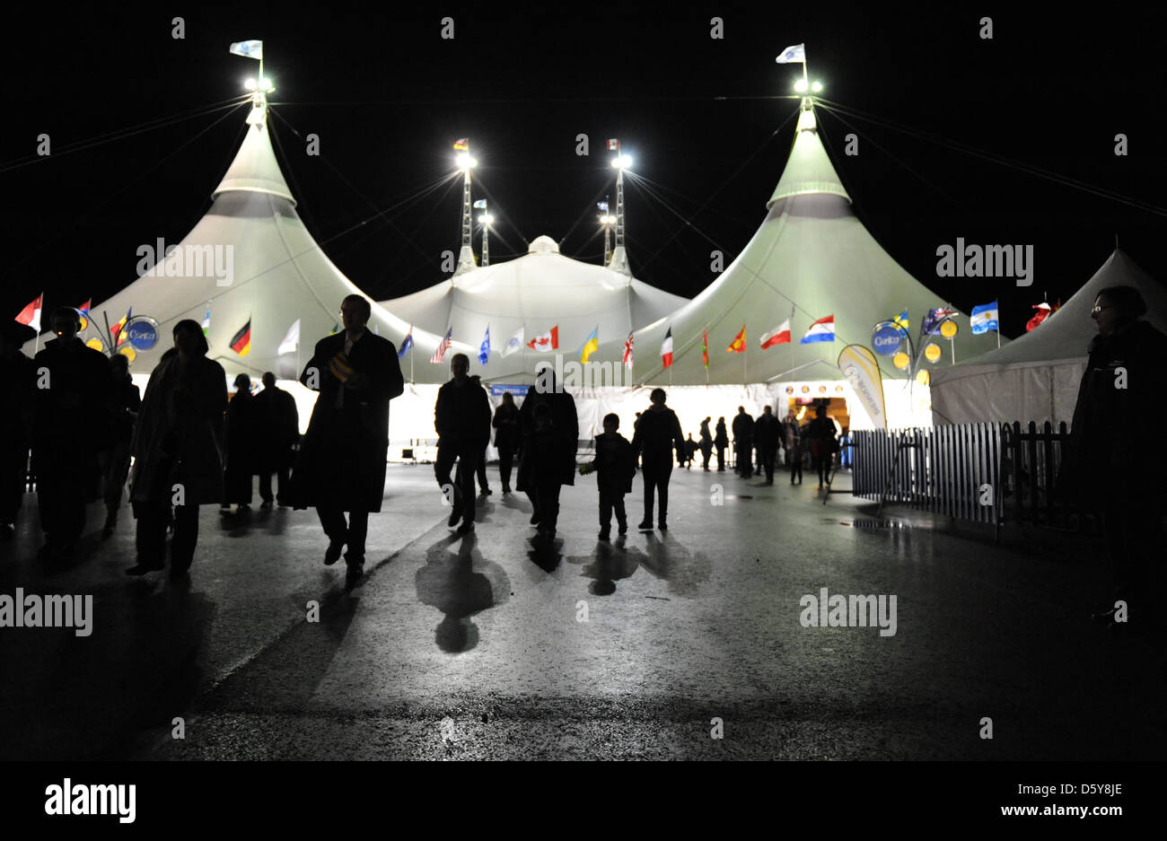 People leave the circus tent after rehearsals of the Cirque du Soleil ...