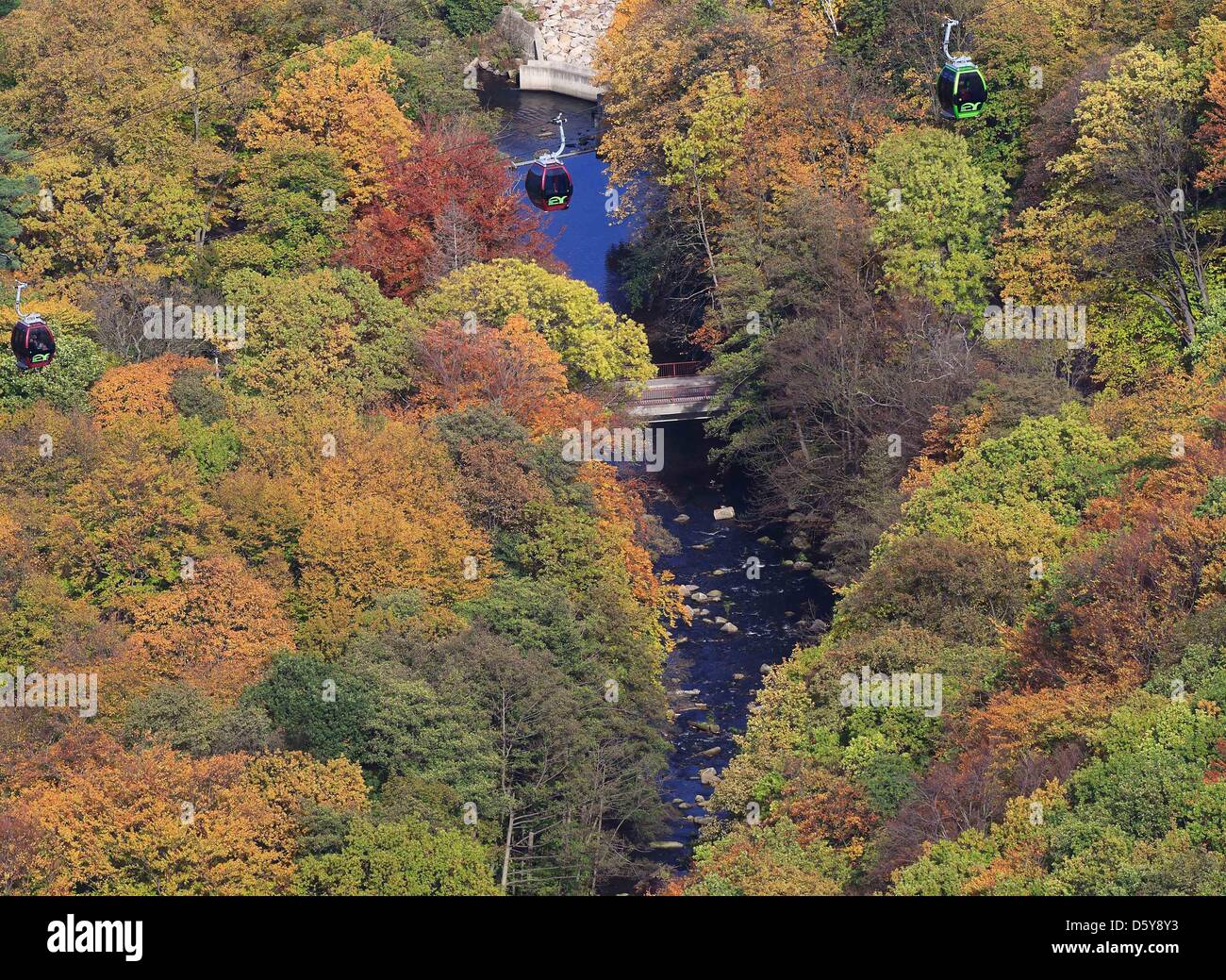 Cabins of the Thale GmbH cable car hover above the Bode Valley in Thale ...