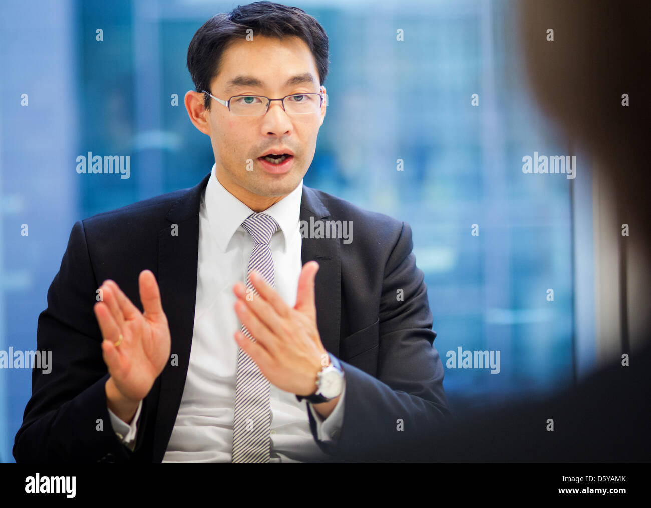 German Economy Minister Philipp Roesler speaks during an interview in ...