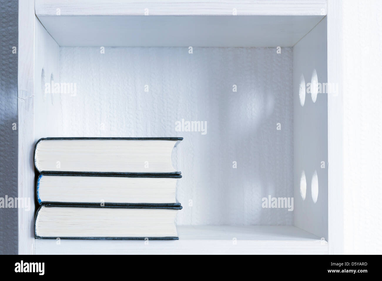 Three book hi-res stock photography and images - Alamy