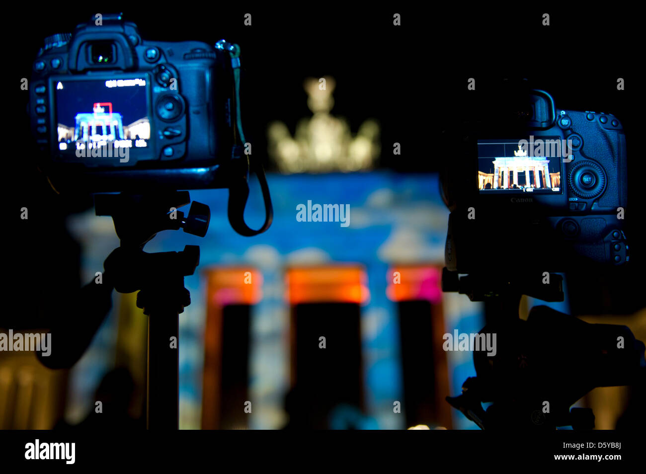 Two photo cameras stand in front of Brandenburg Gate in Berlin, Germany ...