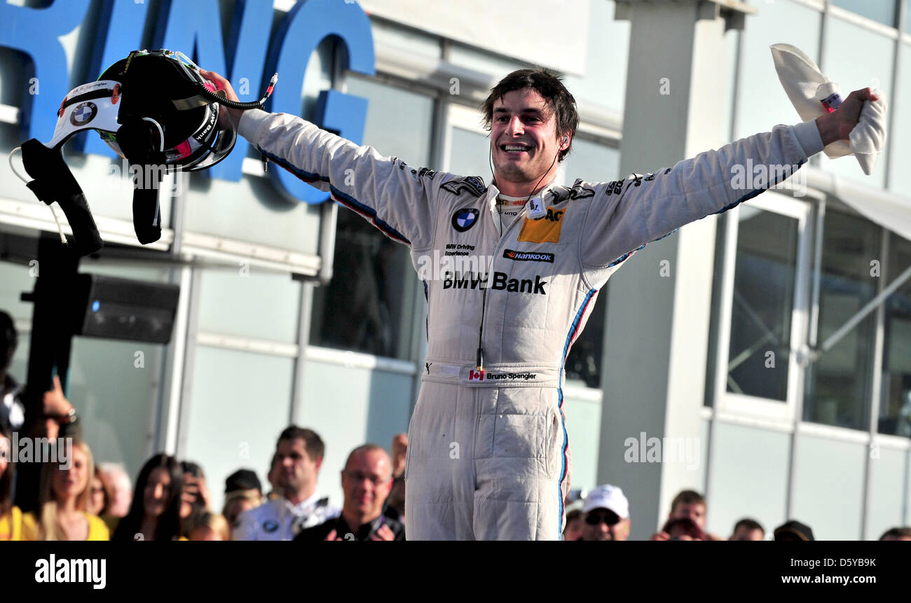 Canadian racing driver Bruno Spengler of team BMW Schnitzer celebrates ...