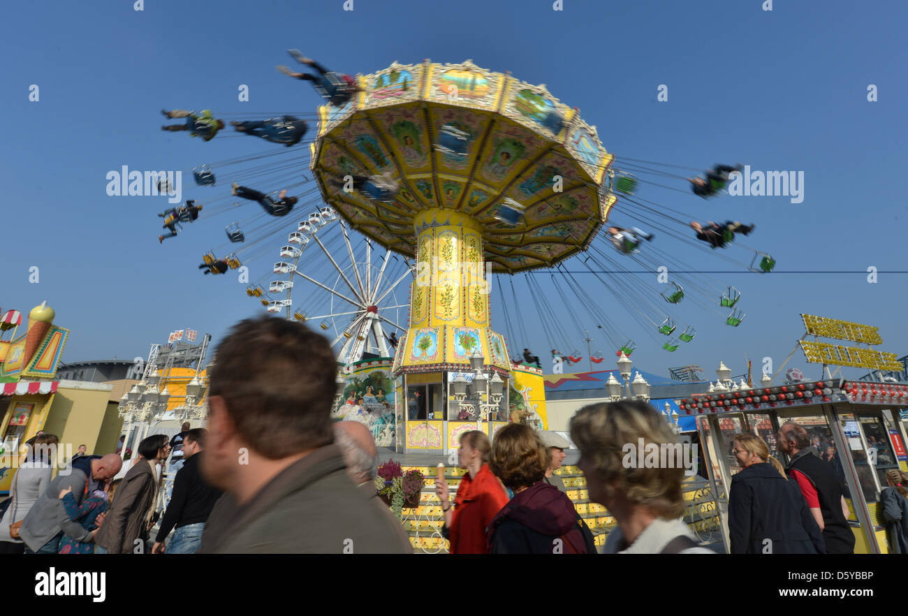 Visitors drive a carousel at Freimarkt funfair in Bremen, Germany, 21 ...