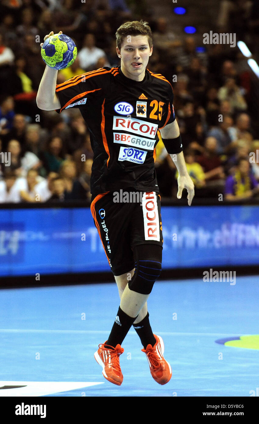 Schaffhausen's Christian Dissinger plays the ball during the handball ...