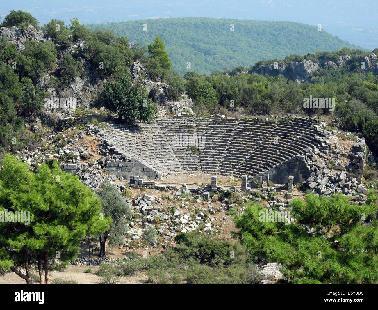 View of the amphitheatre and ruins of the ancient Lycian city Pinara at ...