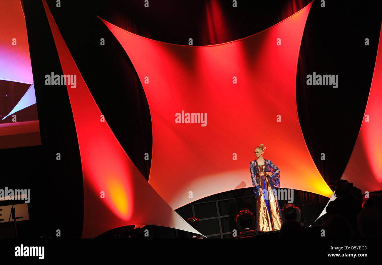 A model presents clothes by Moroccan designer Najia Abadi at the ...