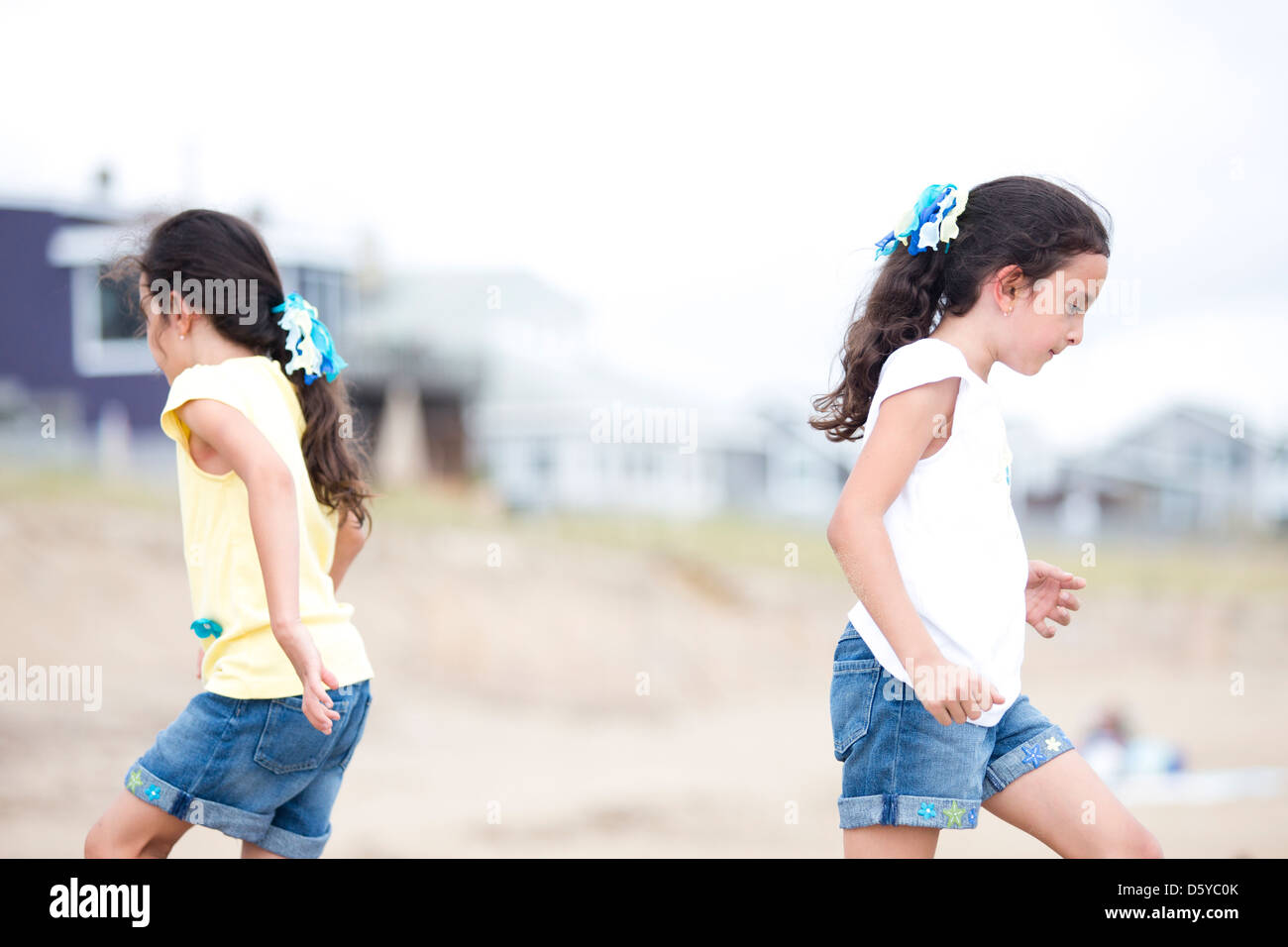 Two people walking opposite directions hi-res stock photography and ...