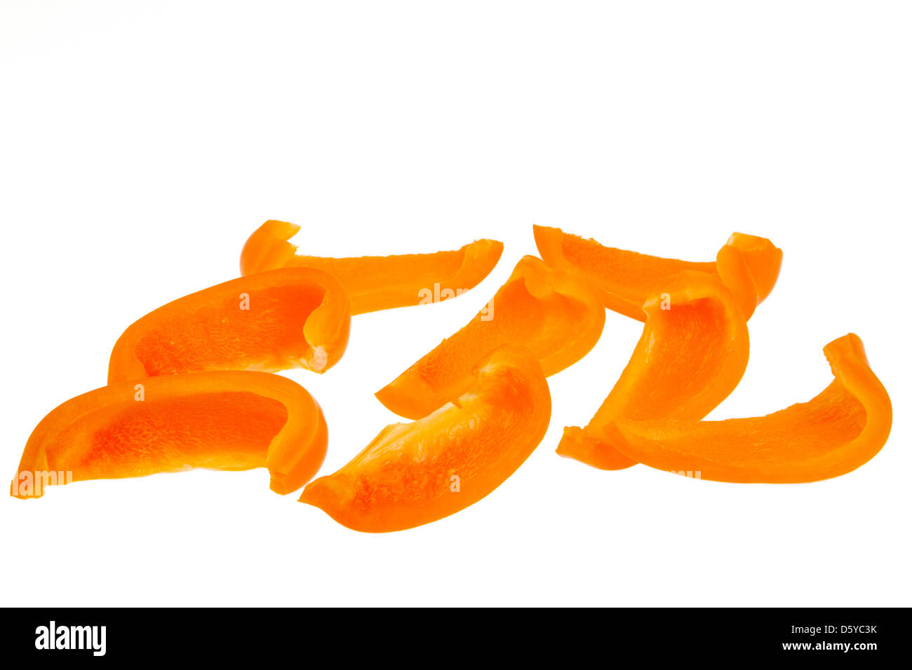 Top view Orange bell pepper cut into slices isolated on white ...