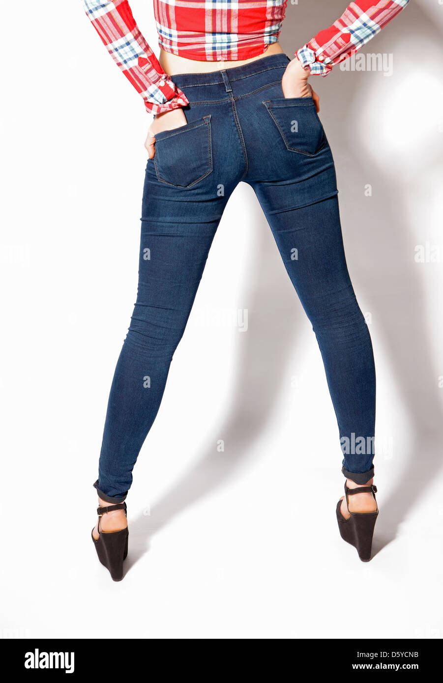 Back View of Woman with Hands in Pockets, Low Section Stock Photo - Alamy