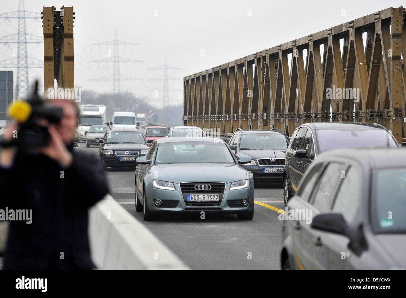 The first cars drive over the temporary bridge on Autobahn A57 near ...