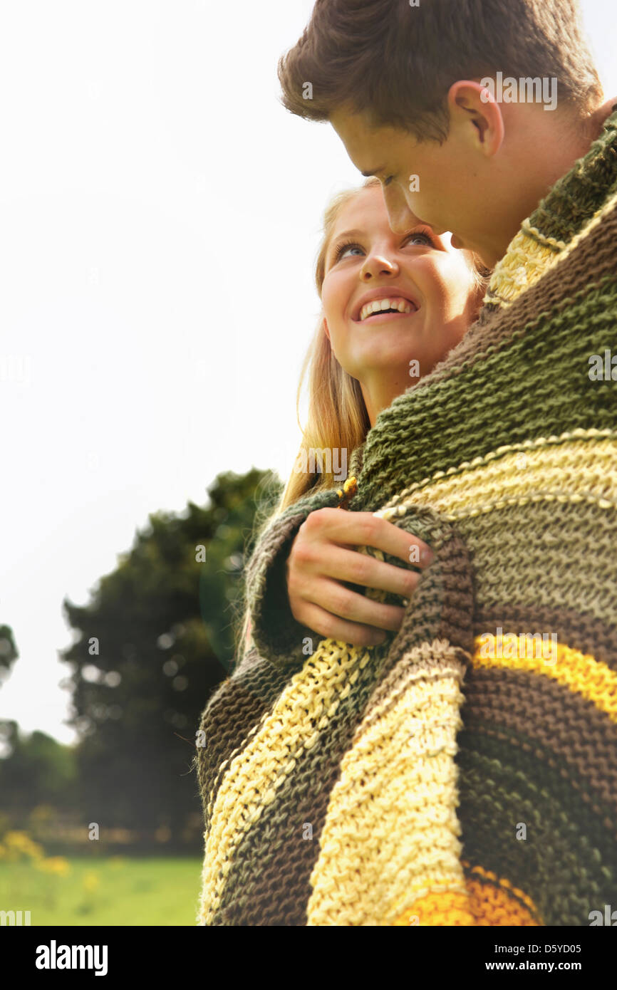 People arms wrapped around each other hi-res stock photography and ...