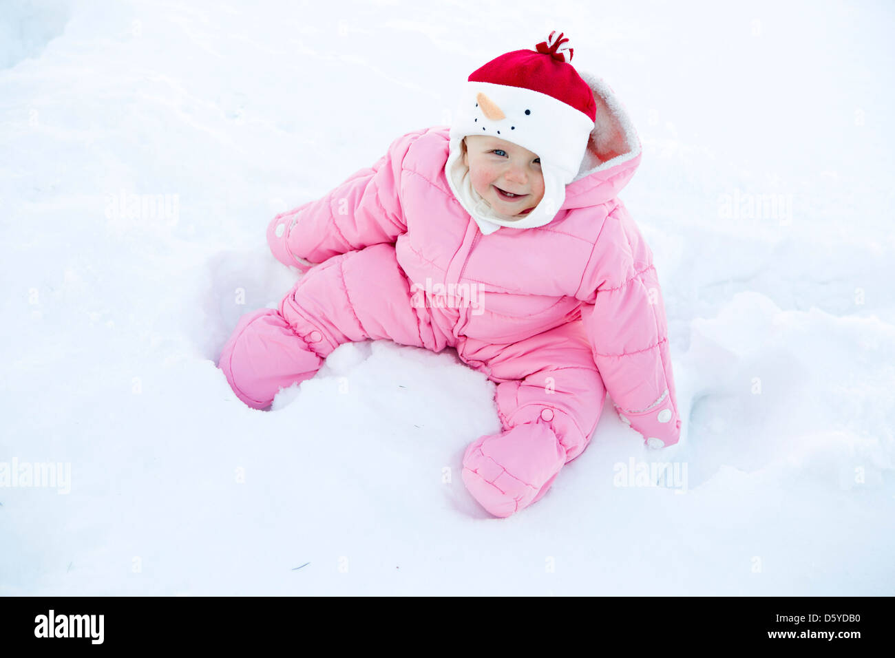 Baby in snowsuit hi-res stock photography and images - Alamy