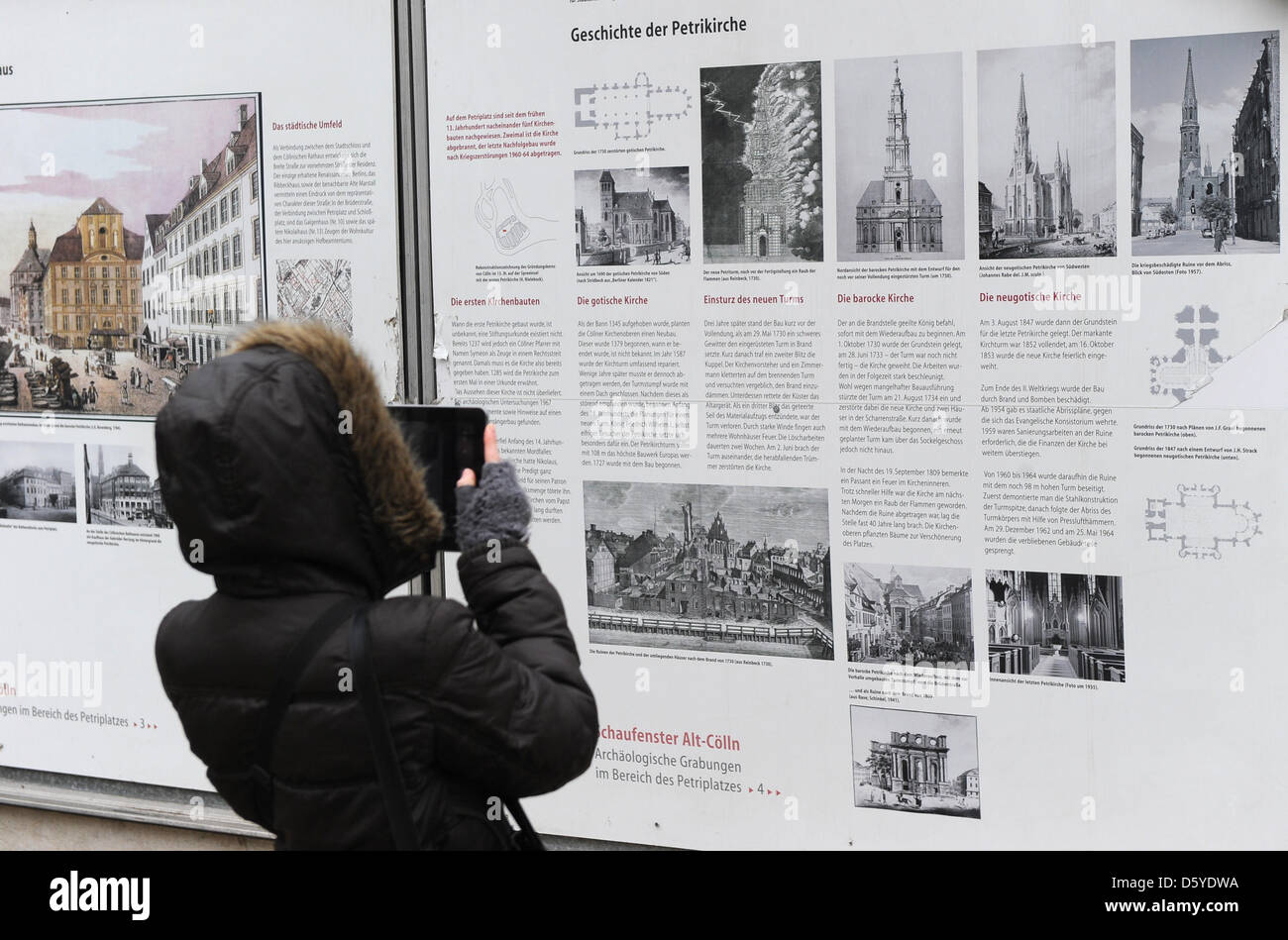 Visitors view the excavations at the Petriplatz square in Berlin ...