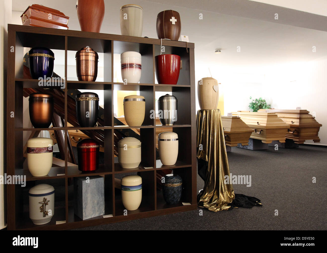 A shelf of urns is pictured in a funeral home in Muenster, Germany, 30 ...