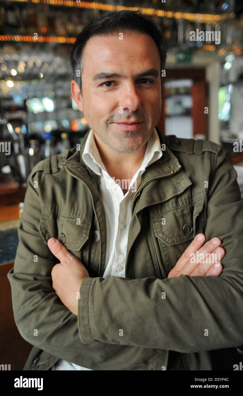 Actor, director and screenwriter Carlos Lobo poses in a cafe in Cologne ...