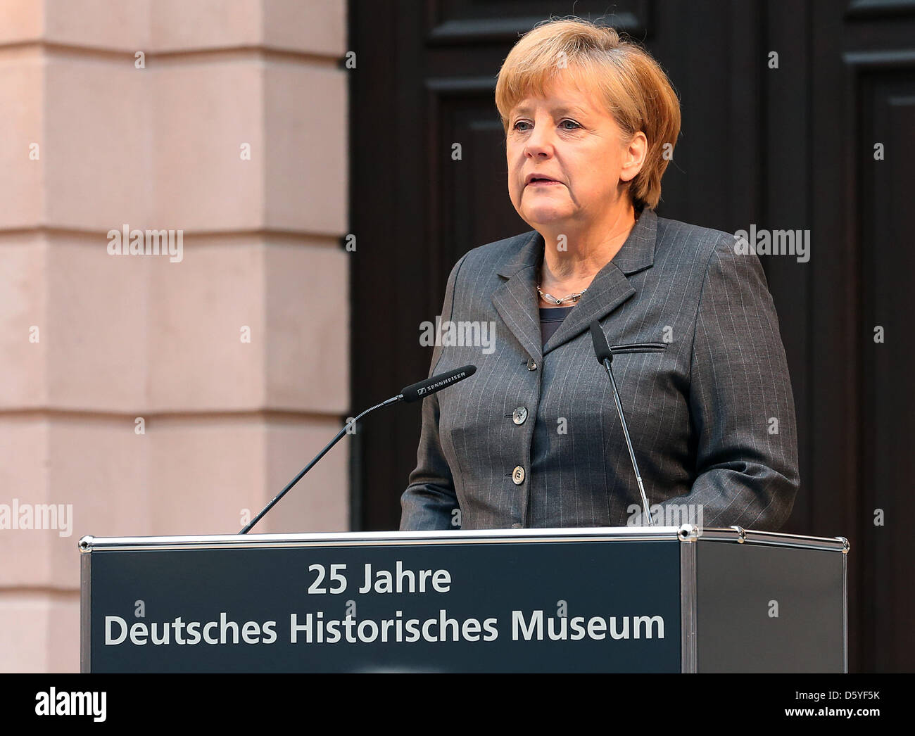German Chancellor Angela Merkel delivers a speech at the German ...