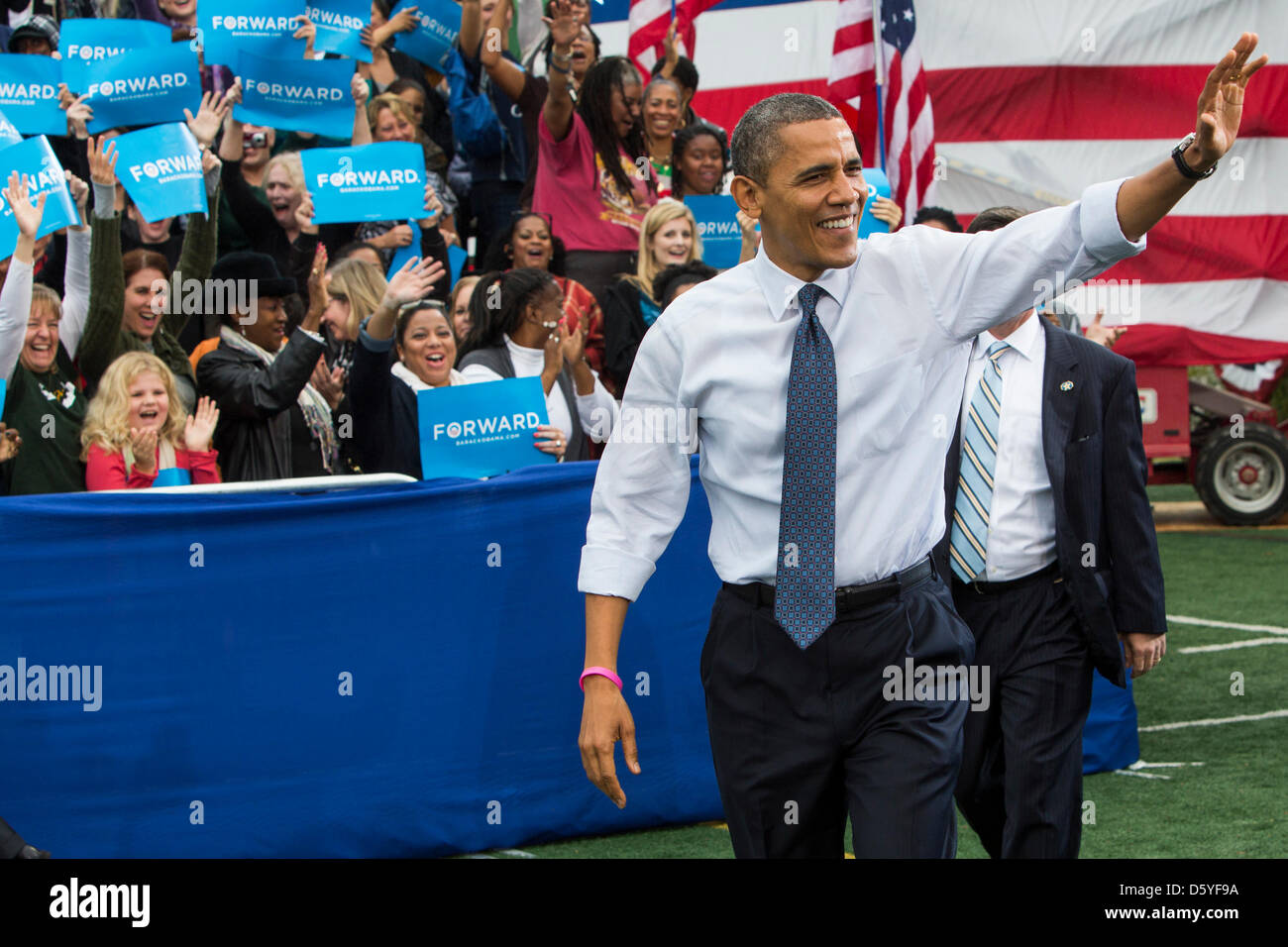 United States President Barack Obama waves to supporters as he arrives ...