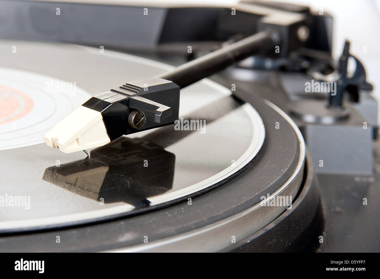 Close up of gramophone needle over black vinyl Stock Photo - Alamy