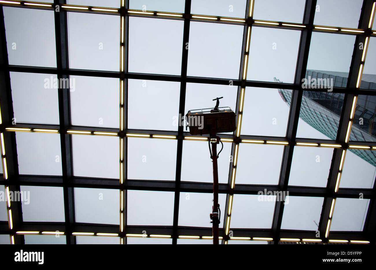 The roof windows are cleaned during dull weather at Potsdamer Platz ...