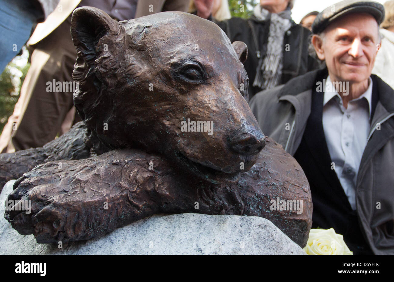 Artist Josef Tabachnyk poses next to the new bronze statue of polar ...