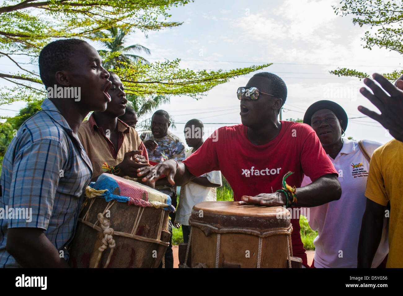 African man drumming with singers and dancers in Kribi Cameroon Africa ...
