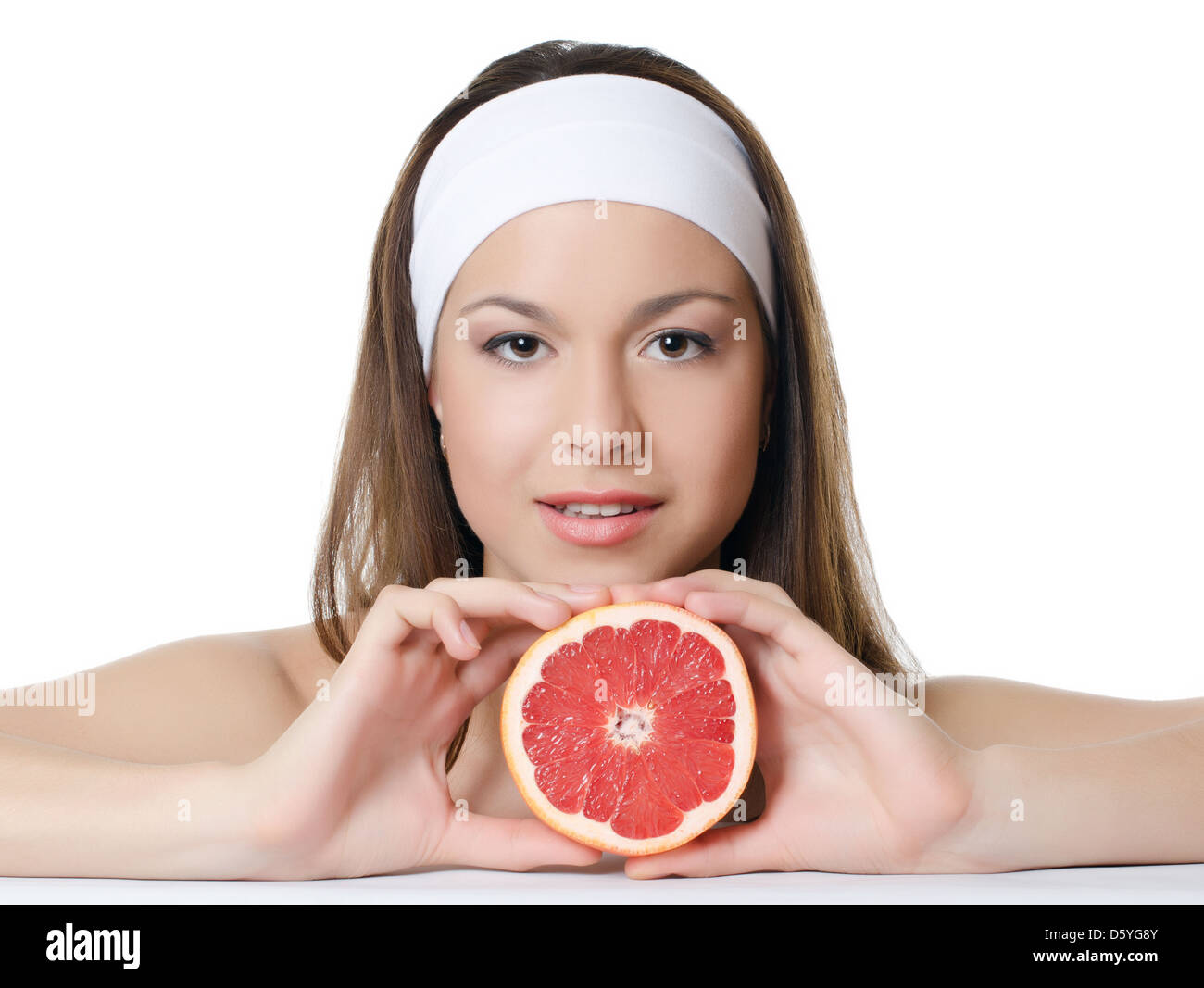 The beautiful woman with a grapefruit Stock Photo - Alamy
