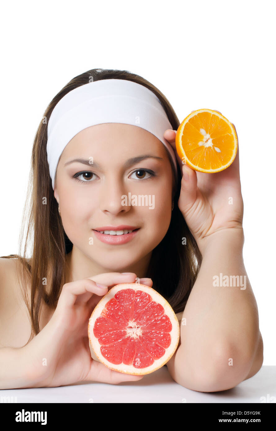 The beautiful woman with a grapefruit Stock Photo - Alamy