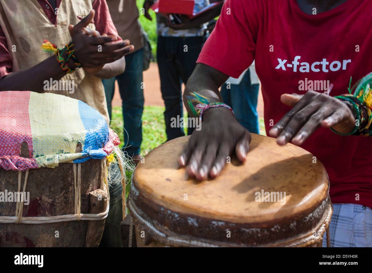 African man drumming with singers and dancers in Kribi Cameroon Africa ...