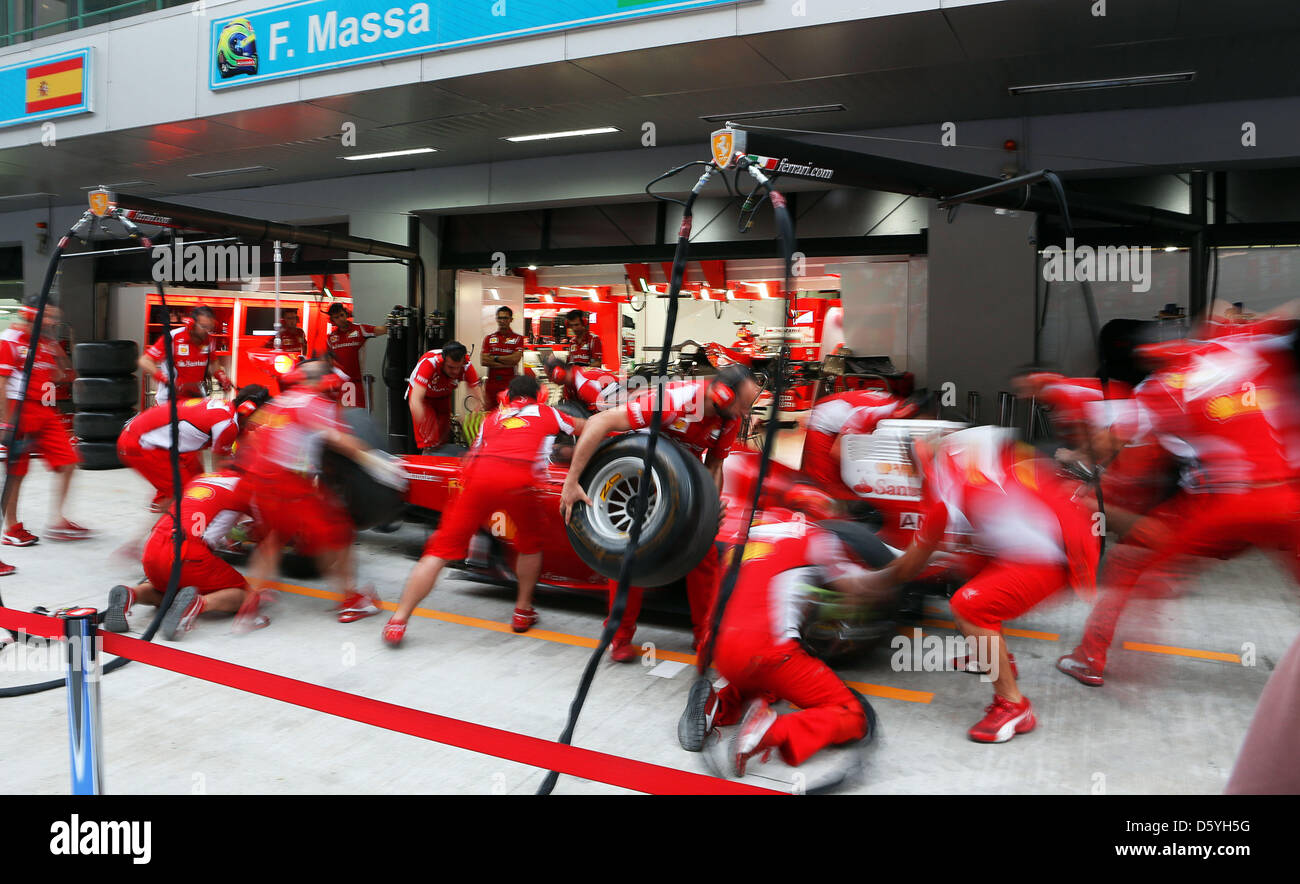 Ferrari stops on circuit hi-res stock photography and images - Alamy