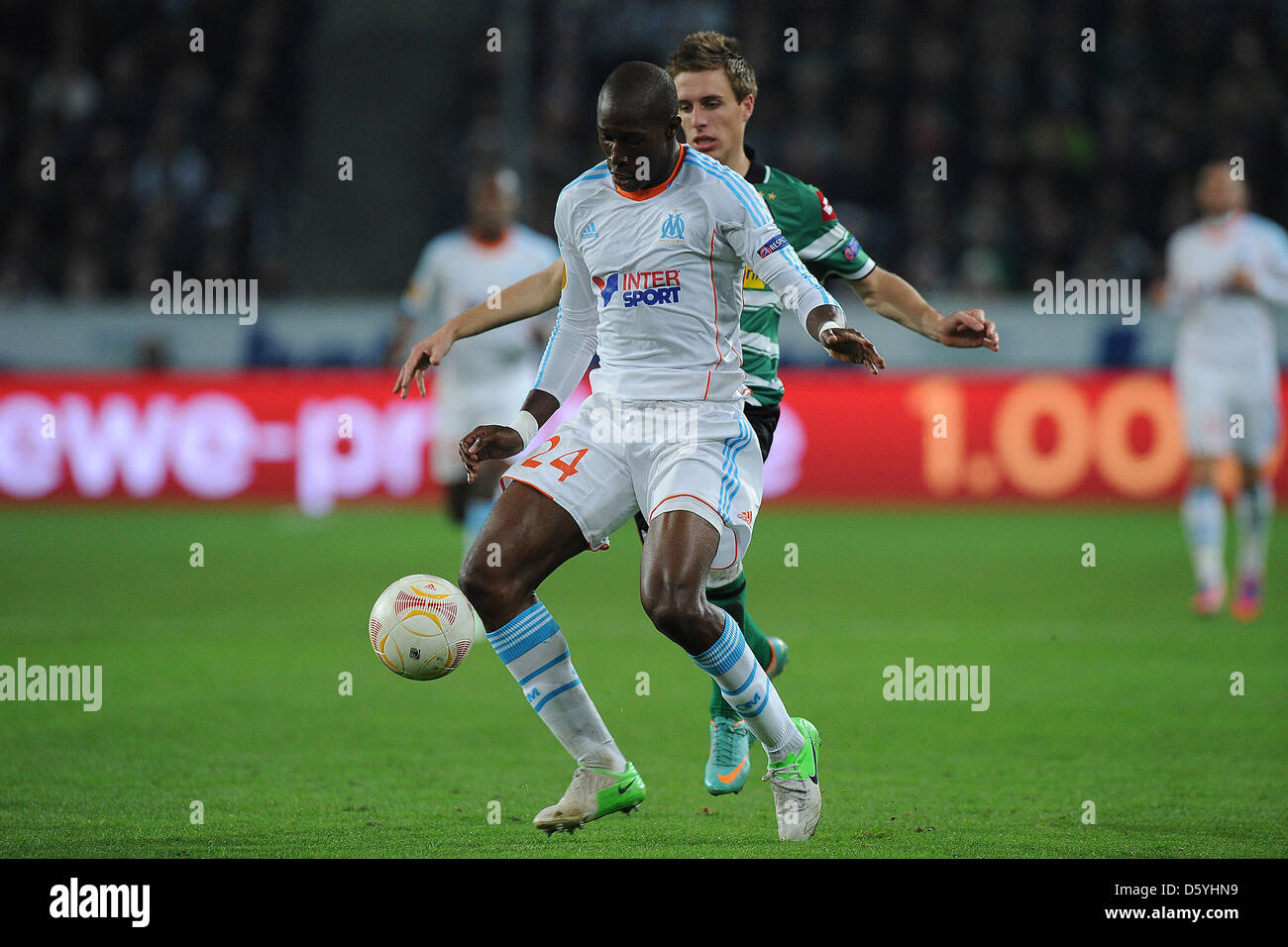 Marseille's Rod Fanni (front) and Moenchengladbach's Patrick Hermann ...