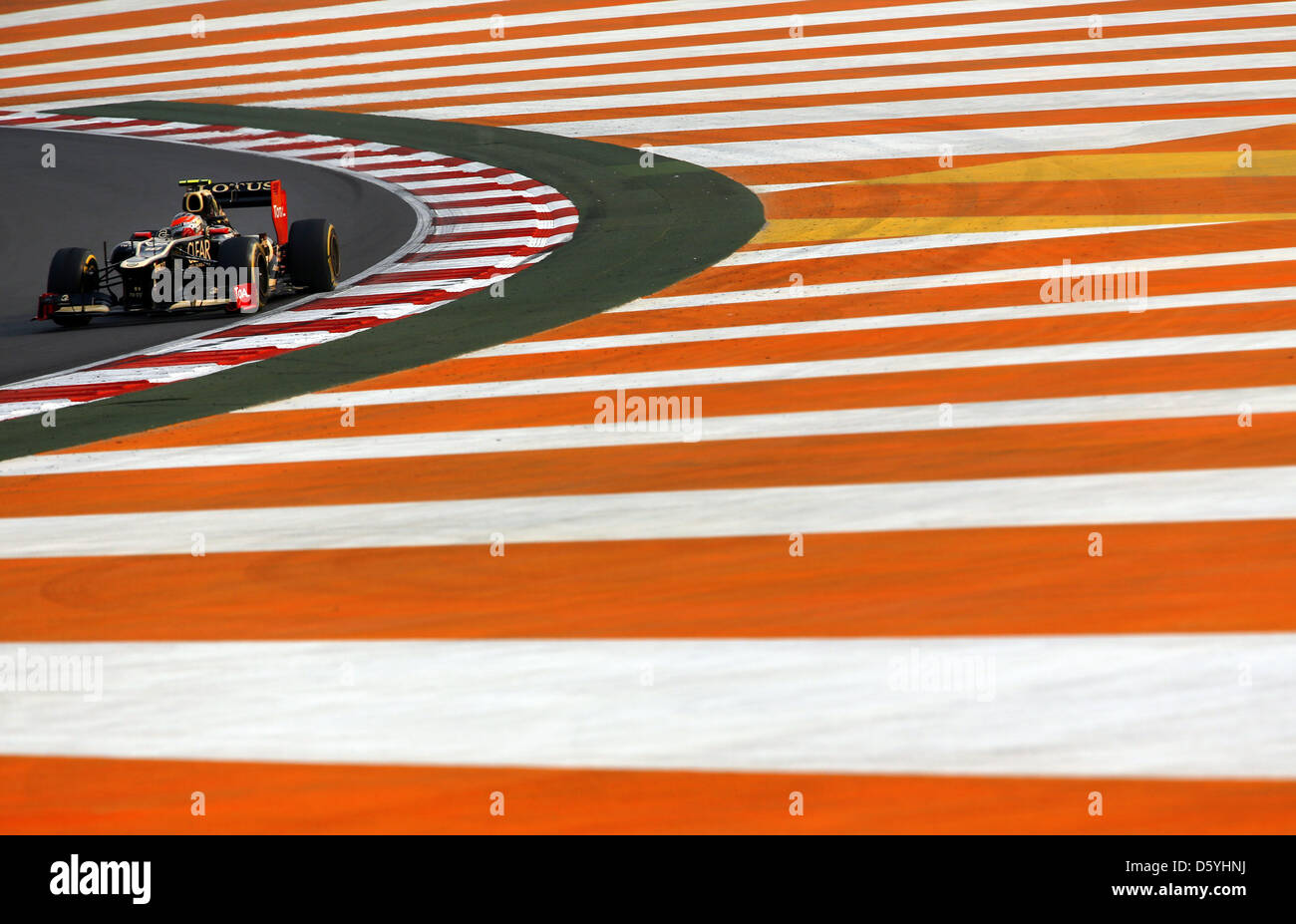 French Formula One driver Romain Grosjean of Lotus steers his car ...