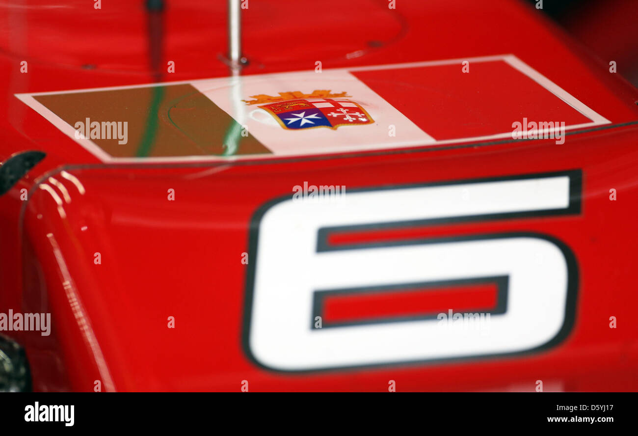 The Italian Navy flag is seen on the racing car of Brazilian Formula ...