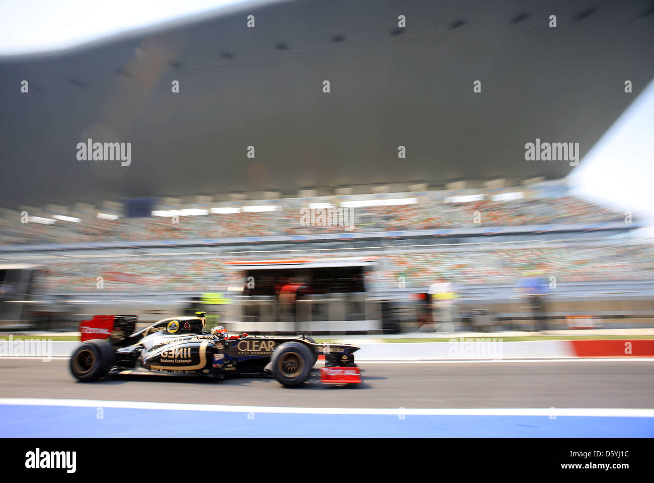 French Formula One driver Romain Grosjean of Lotus steers his car ...