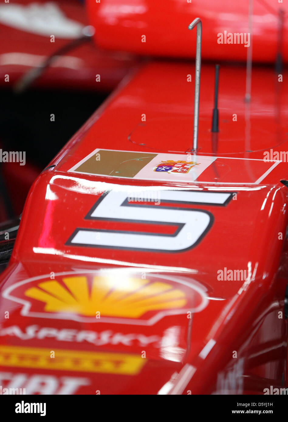The Italian Navy flag is seen on a Ferrari Formula One racing car of ...