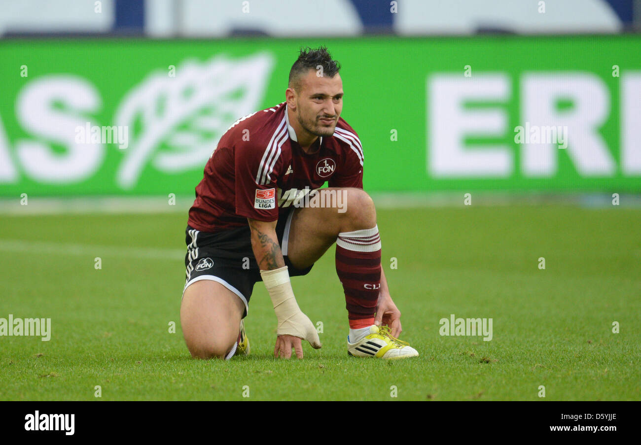 Nuremberg's Timo Gebhart kneels during the German Bundesliga match ...