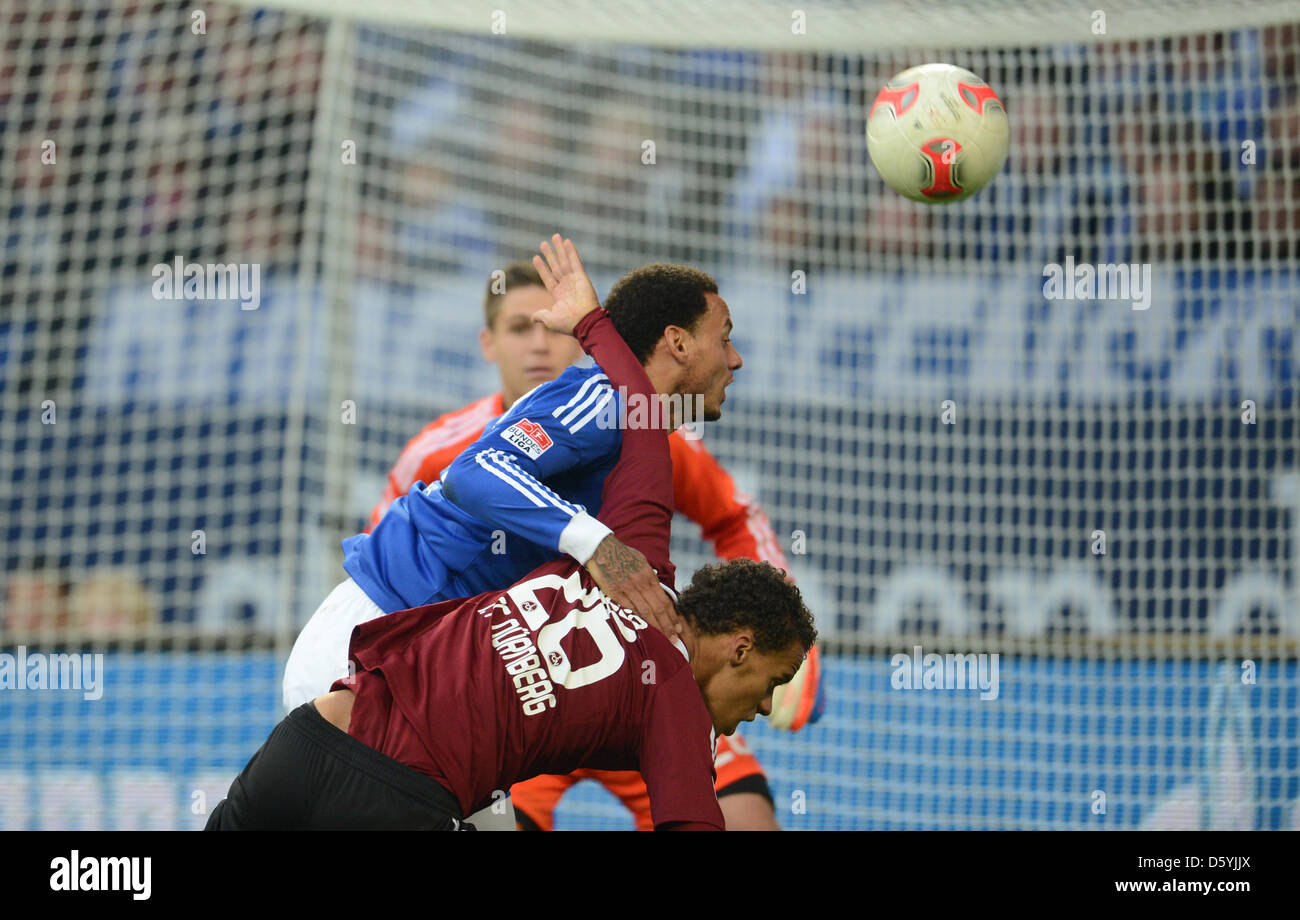 Schalke's Jermaine Jones (L) vies for the ball with Nuremberg's Timothy ...