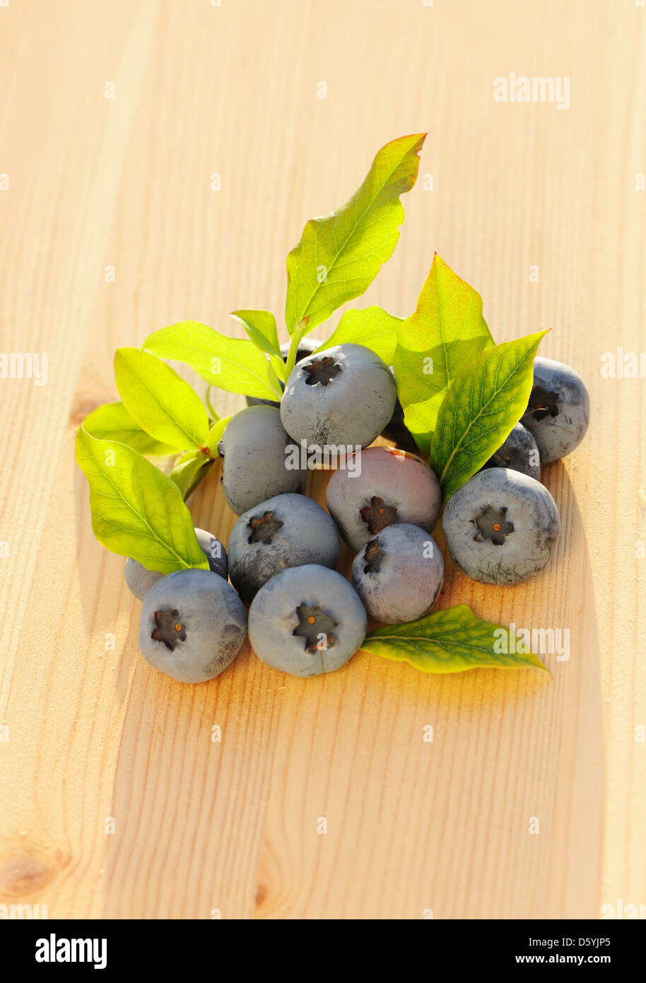 Blueberry on wooden table Stock Photo - Alamy