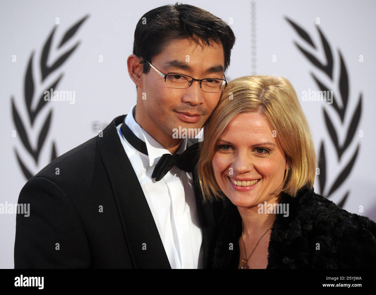 German Economy Minister Philipp Roesler and his wife Wiebke arrives for ...