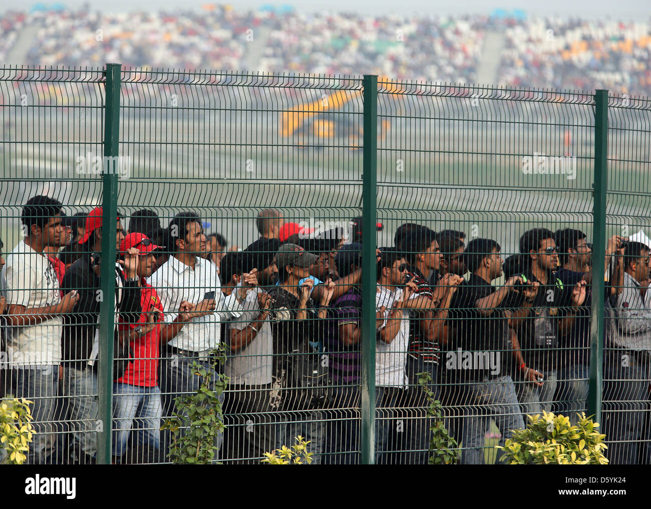 Spectators Behind Fence High Resolution Stock Photography and Images ...