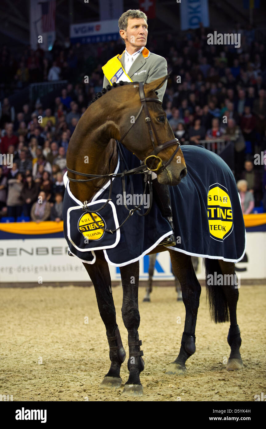 Ludger Beerbaum on Chaman 4 cheers after winning the show jumping ...