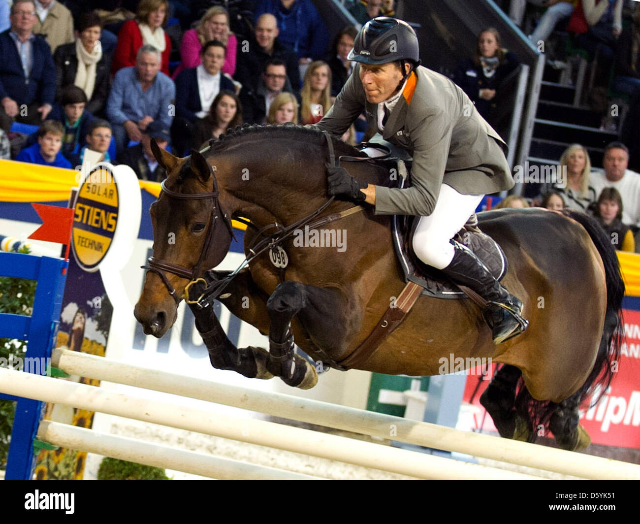 German equestrian Ludger Beerbaum jumps on Chaman 4 during the show ...