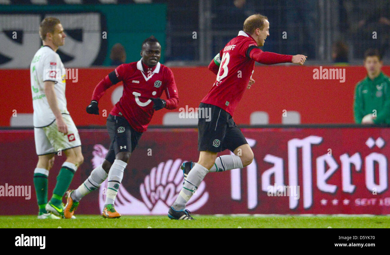 Hanover's Jan Schlaudraff celebrates his 1-0 goal with Didier Ya Konan ...