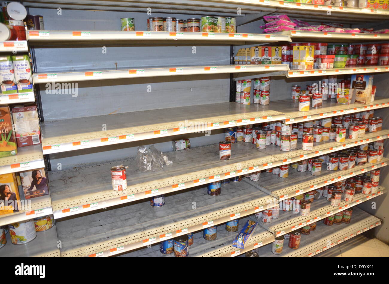 Shelves are empty in a retail store on the Upper East Side in New York ...