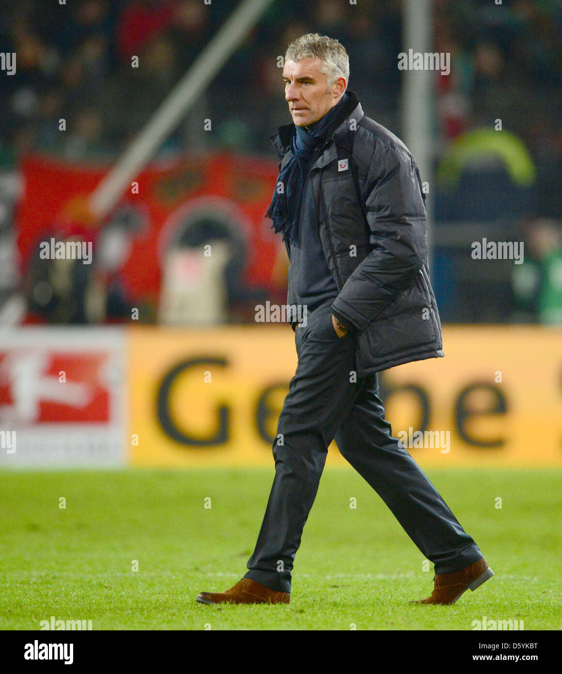 Hanover's head coach Mirko Slomka strolls across the pitch after the ...