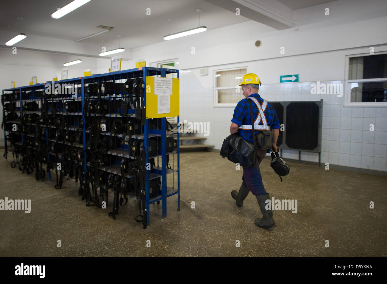 Miners walk into the change house after a shift at the KGHM Polska ...