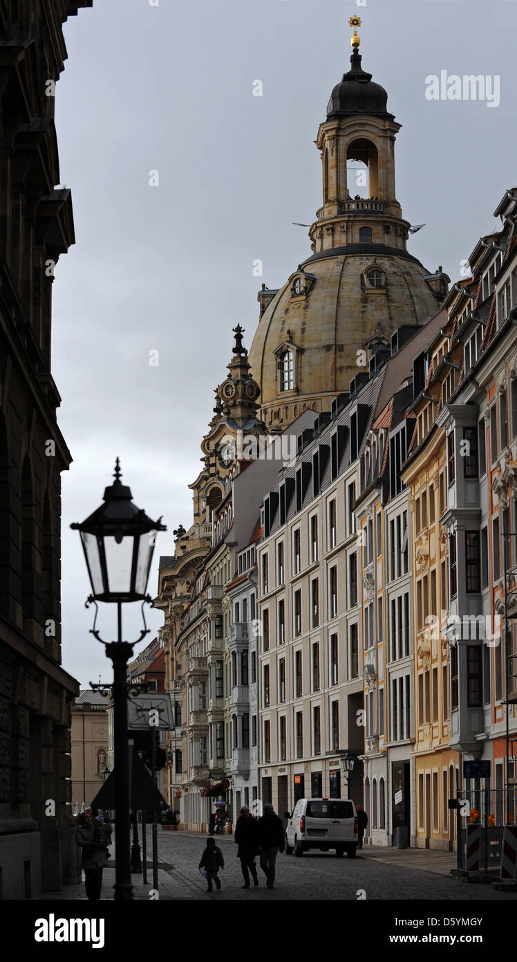 The dome of the Church of Our Lady juts out over the rooves on ...