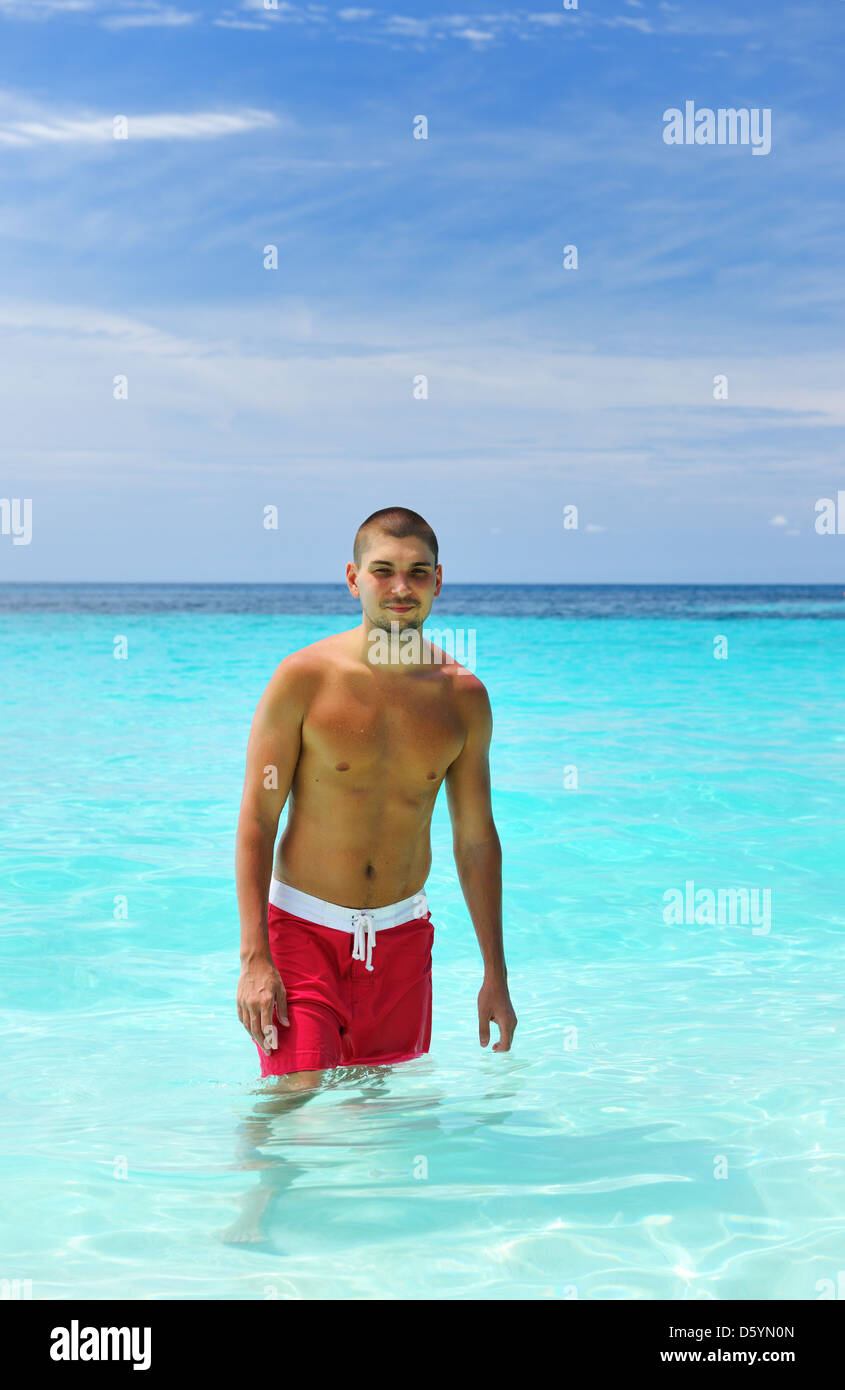 Man at beach Stock Photo - Alamy