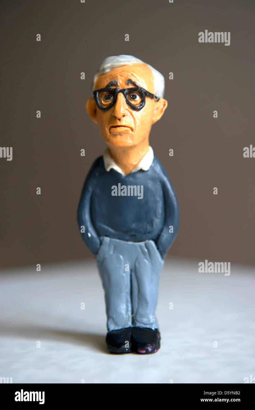 A clay figur of actor and movie director Woody Allen stands on a table ...